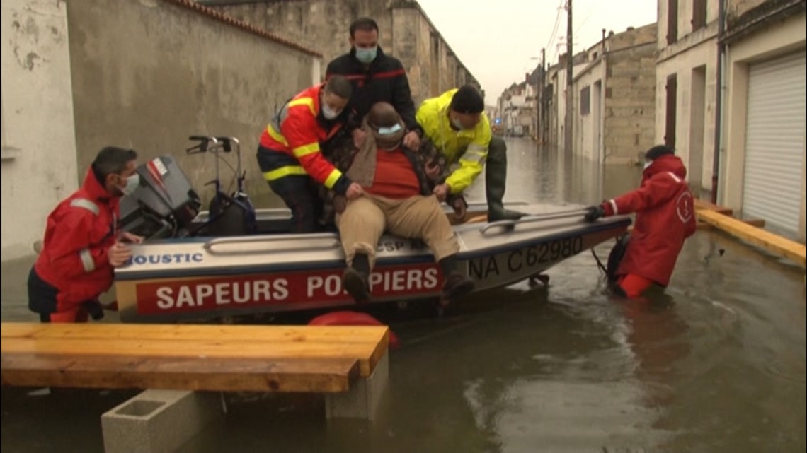 French rescuers evacuate villagers amid historic flooding | cbs8.com