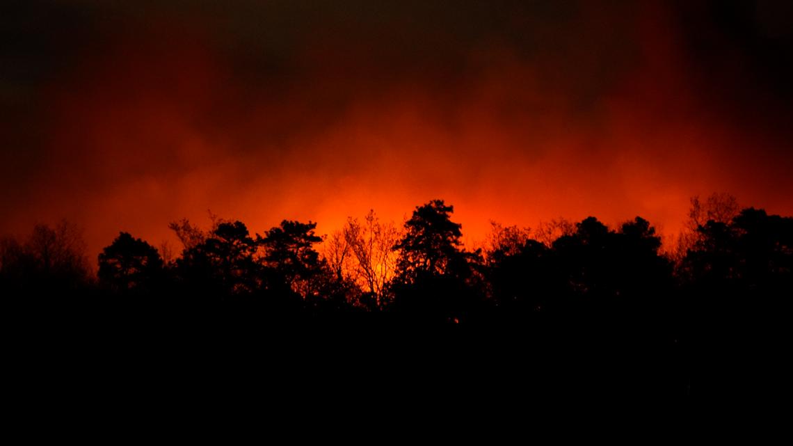 NJ wildfire prompts evacuations, temporarily closes Garden State ...