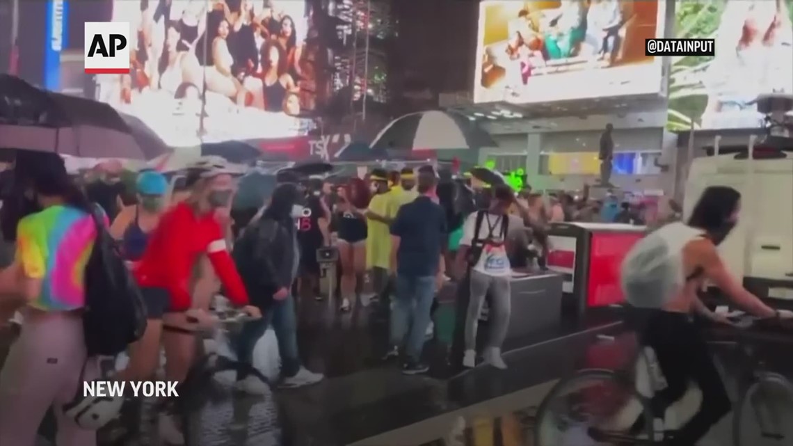 Video shows car plowing through protesters in Times Square | cbs8.com