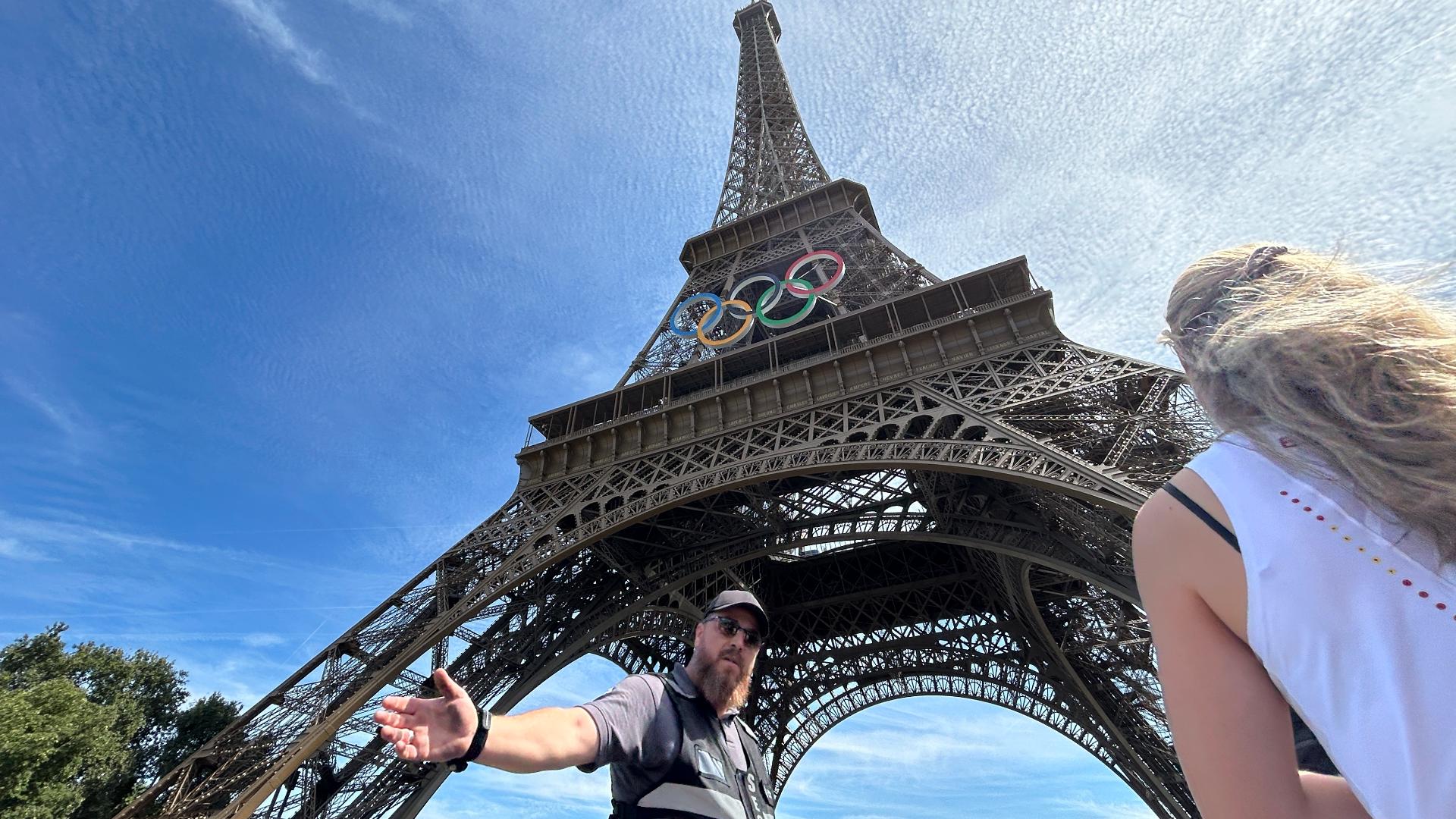 Eiffel Tower evacuated, police arrest man climbing Paris landmark ...