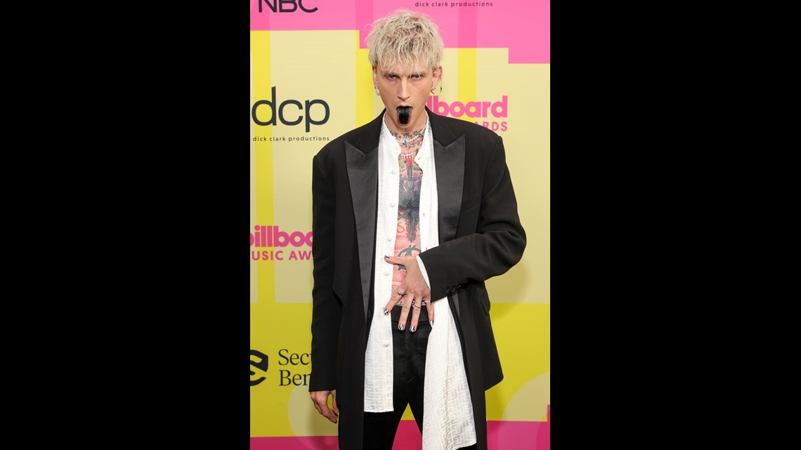 Here's Why Machine Gun Kelly Painted His Tongue Black for 2021 ...