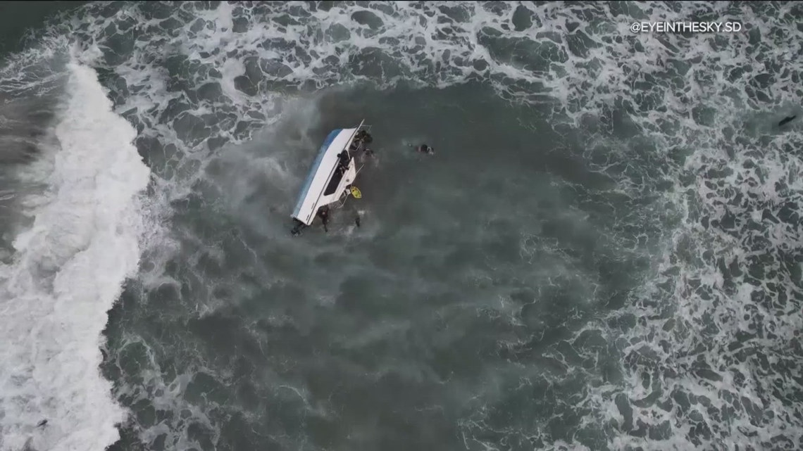 Moment suspected smuggling boat capsizes captured by drone | cbs8.com