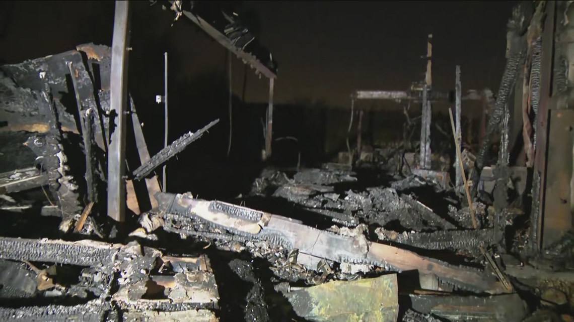 Charred remains and smoldering rubble is all that's left in some areas ...