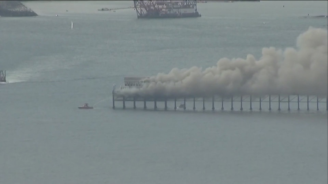 Fire crews contain spread of massive fire that erupted on historic Oceanside Pier | cbs8.com