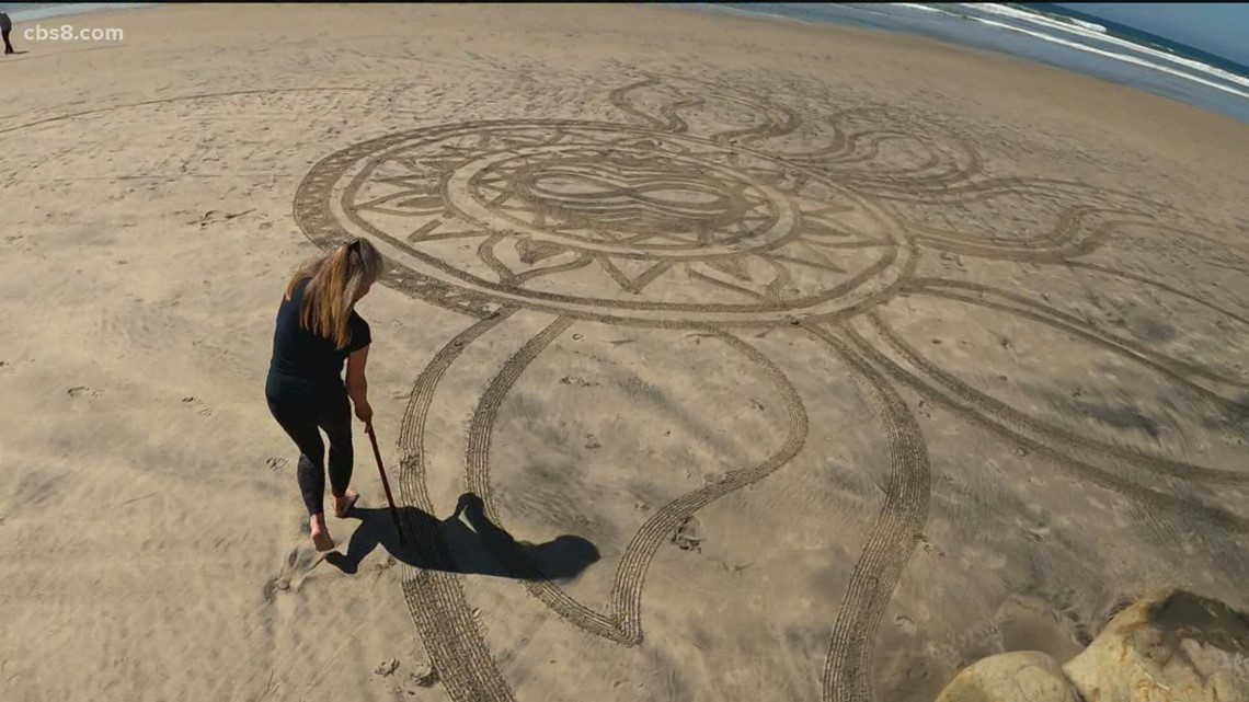 A wide sandy beach is the perfect canvas for a San Diego artist | cbs8.com