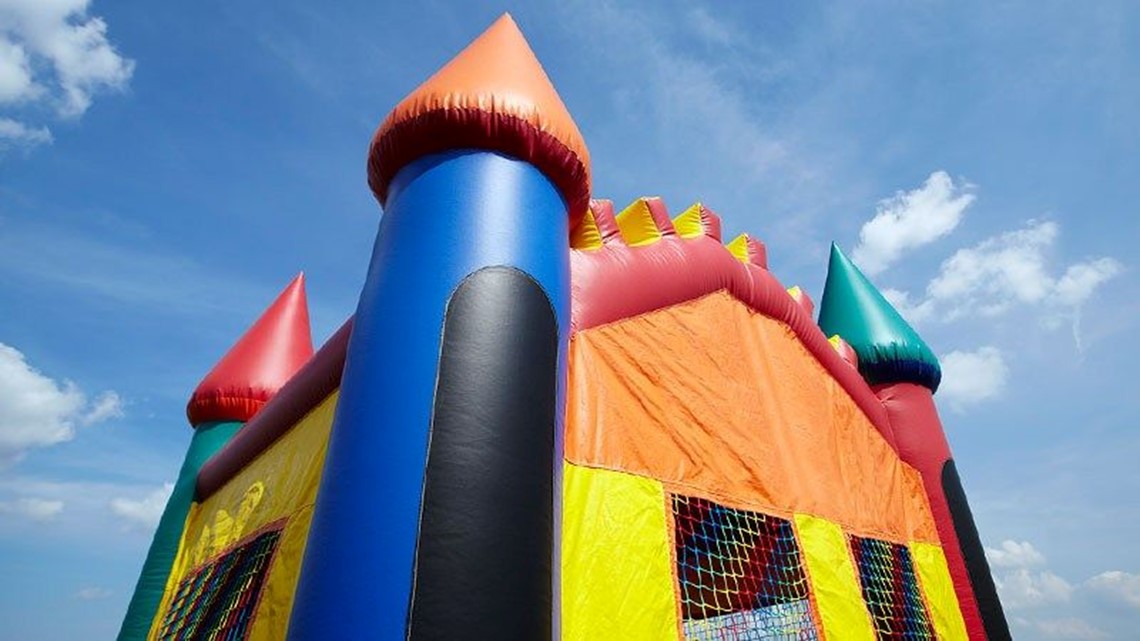Bounce house with child inside rolls onto California highway | cbs8.com