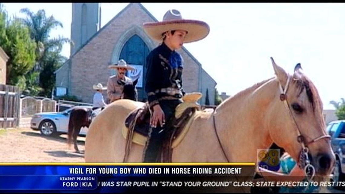Vigil for young boy who died in horse riding accident | cbs8.com