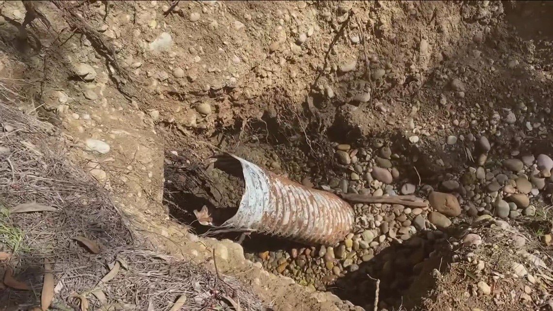 Ruptured stormwater pipe eroding hillside behind homes in Scripps Ranch ...