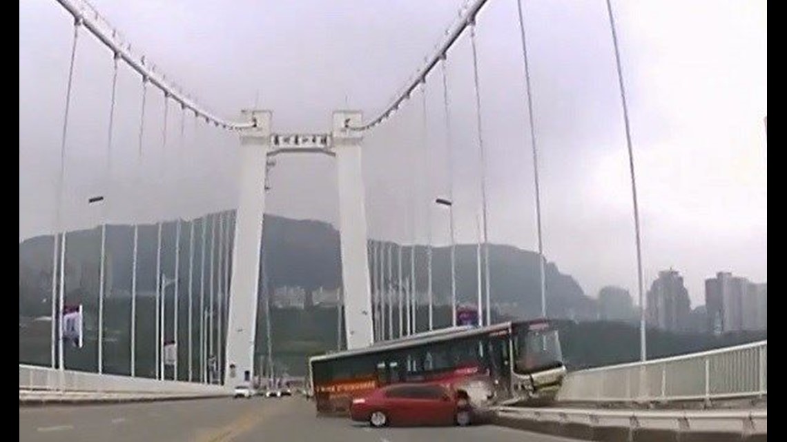 Video shows bus plunging off bridge into river after passenger, driver ...