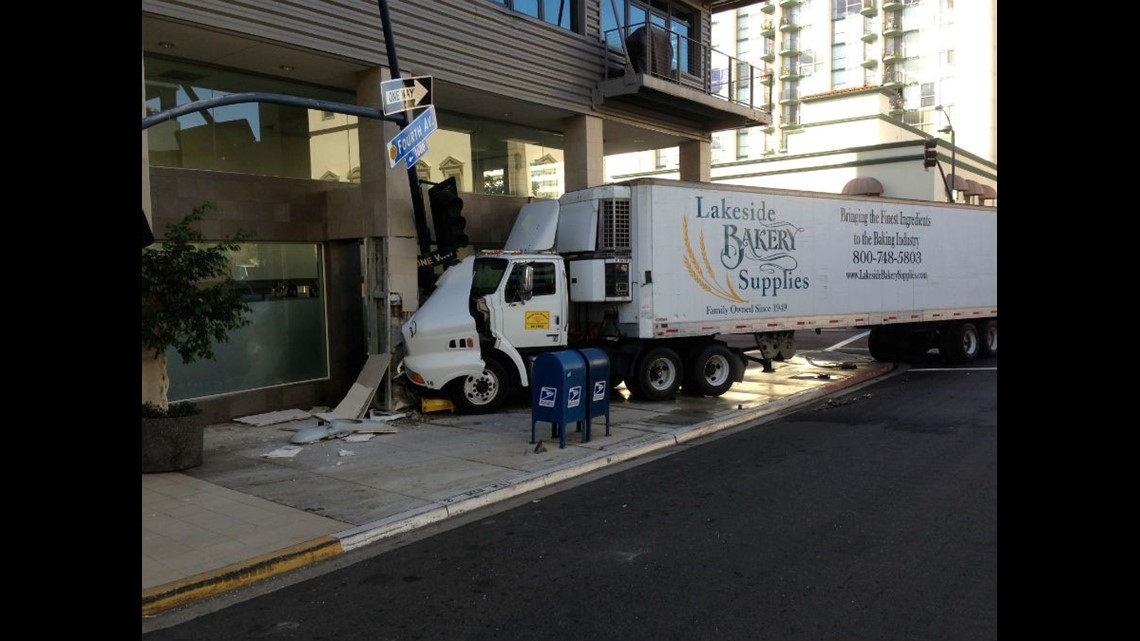 Delivery truck crashes into building | cbs8.com