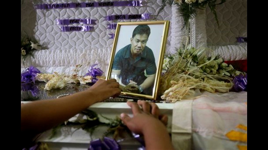 Slain Filipino official caught suspect on camera | cbs8.com