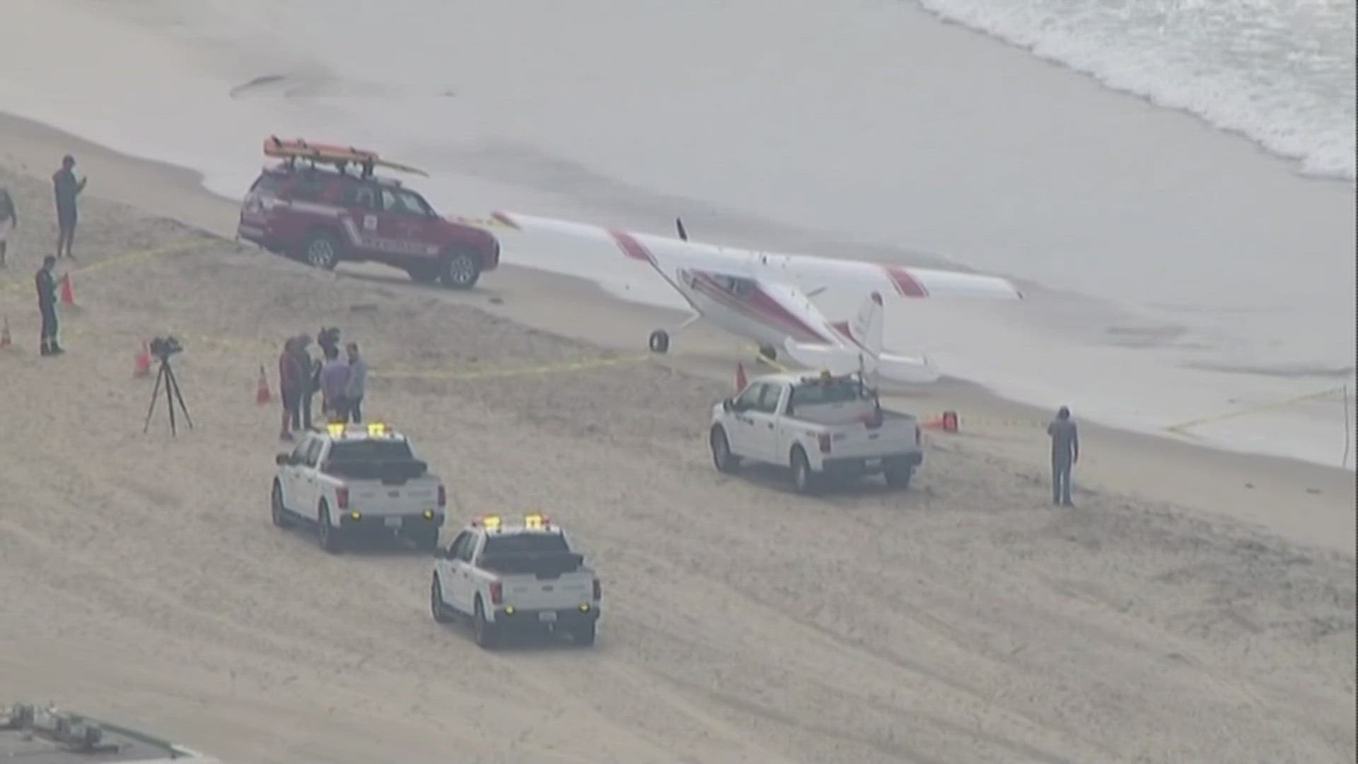 Lifeguards, emergency crews respond after small plane lands on sand ...