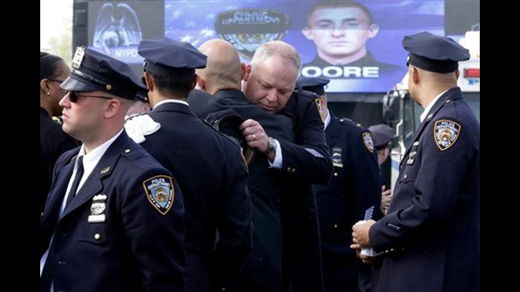 At New York officer's funeral, police reflect on tough time | cbs8.com