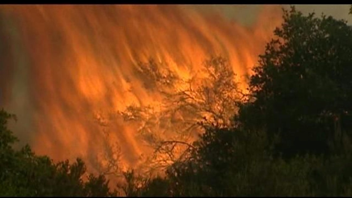 Crews fully surround Shockey Fire burn area | cbs8.com