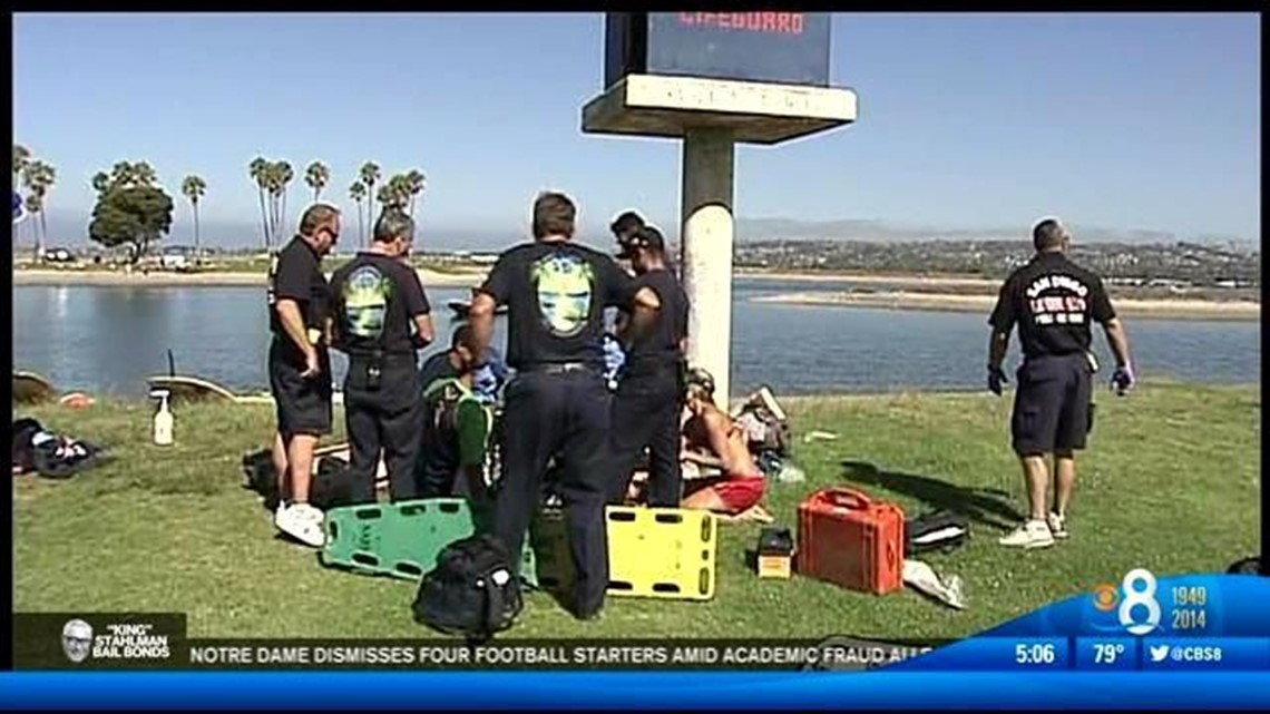 Woman falls 8 feet from lifeguard tower | cbs8.com