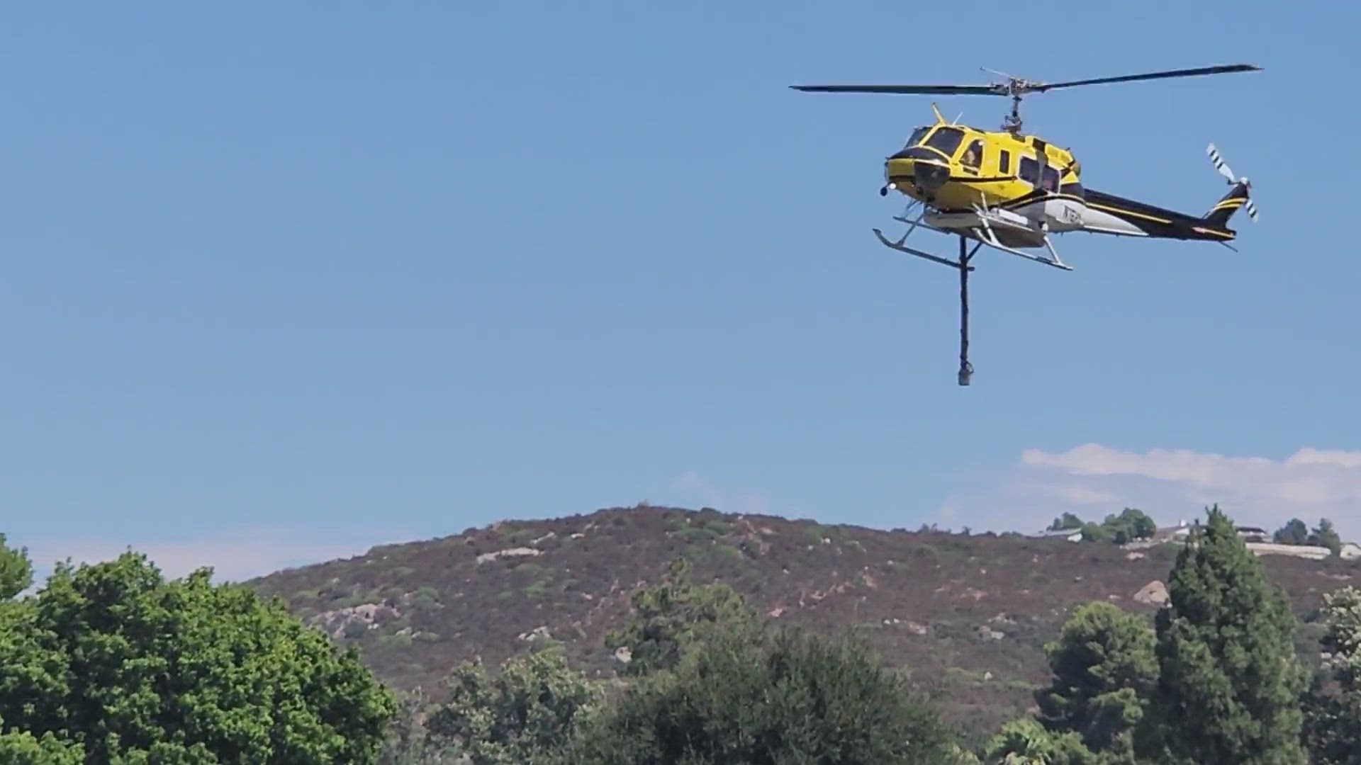 Cal Fire helicopter getting water at San Vicente golf course | cbs8.com