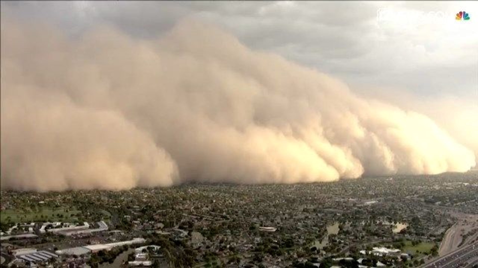 Monsoon storms bring massive wall of dust, down power lines in the ...
