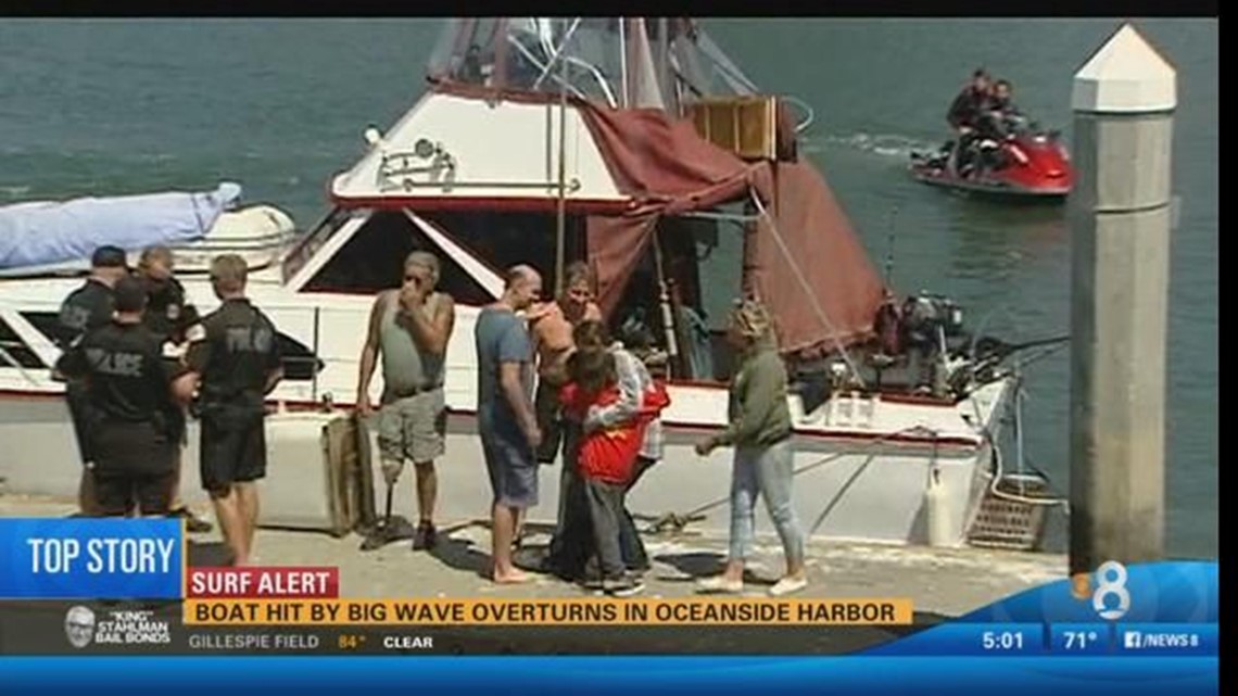 Boat hit by big wave overturns in Oceanside Harbor | cbs8.com