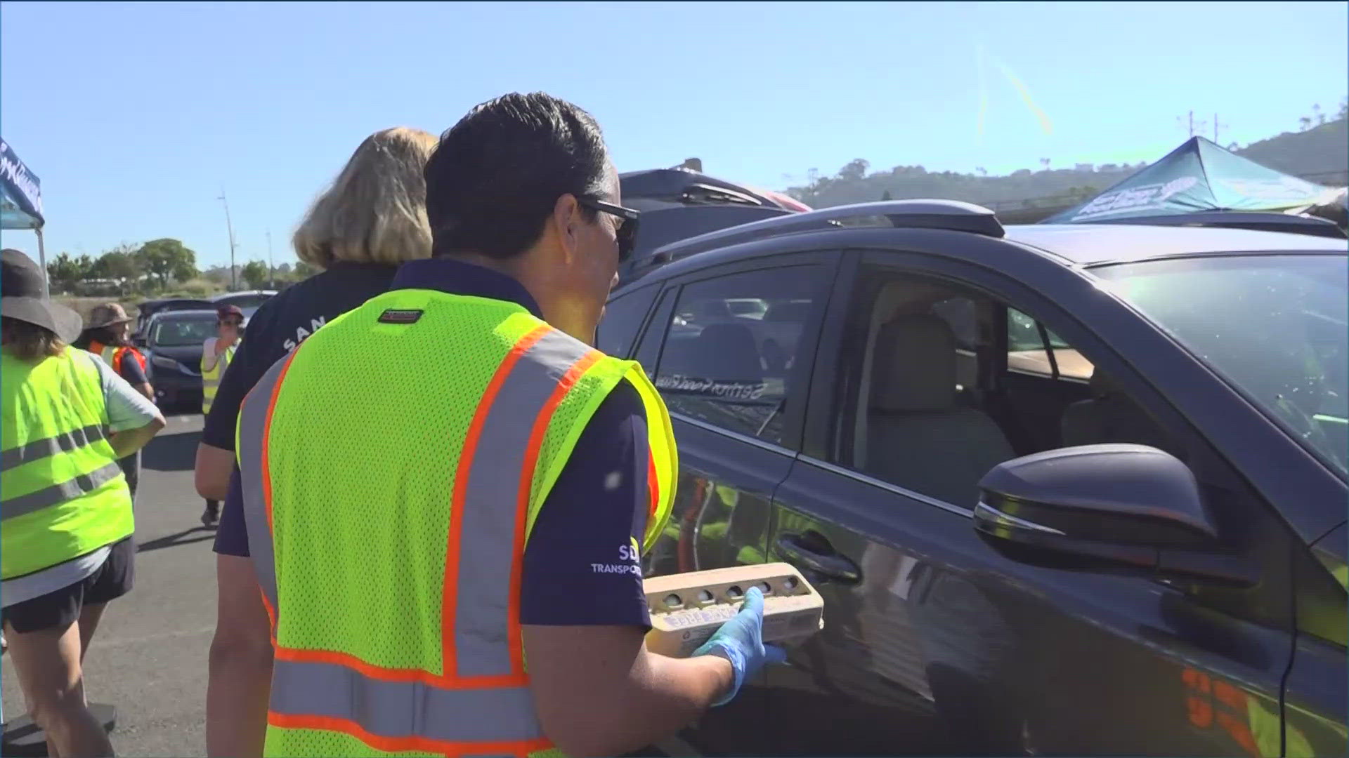 Thousands gather at San Diego Food Bank's emergency food distribution ...