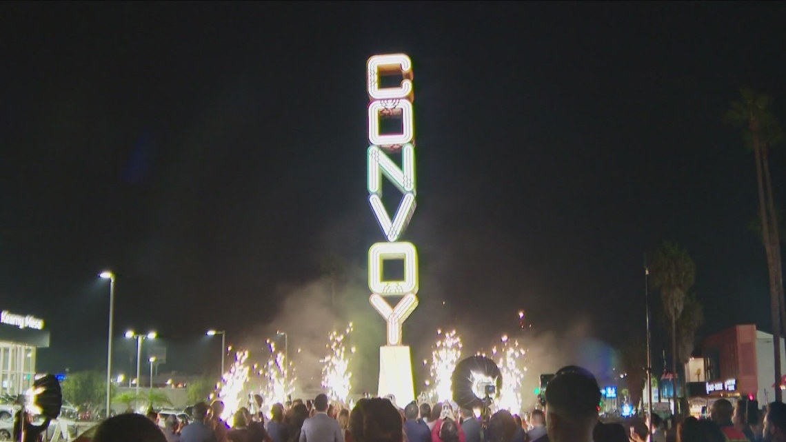 New Convoy District sign lit for first time during unveiling | cbs8.com