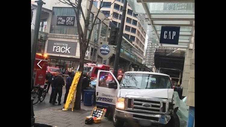 4 injured when van crashes into downtown Seattle building | cbs8.com