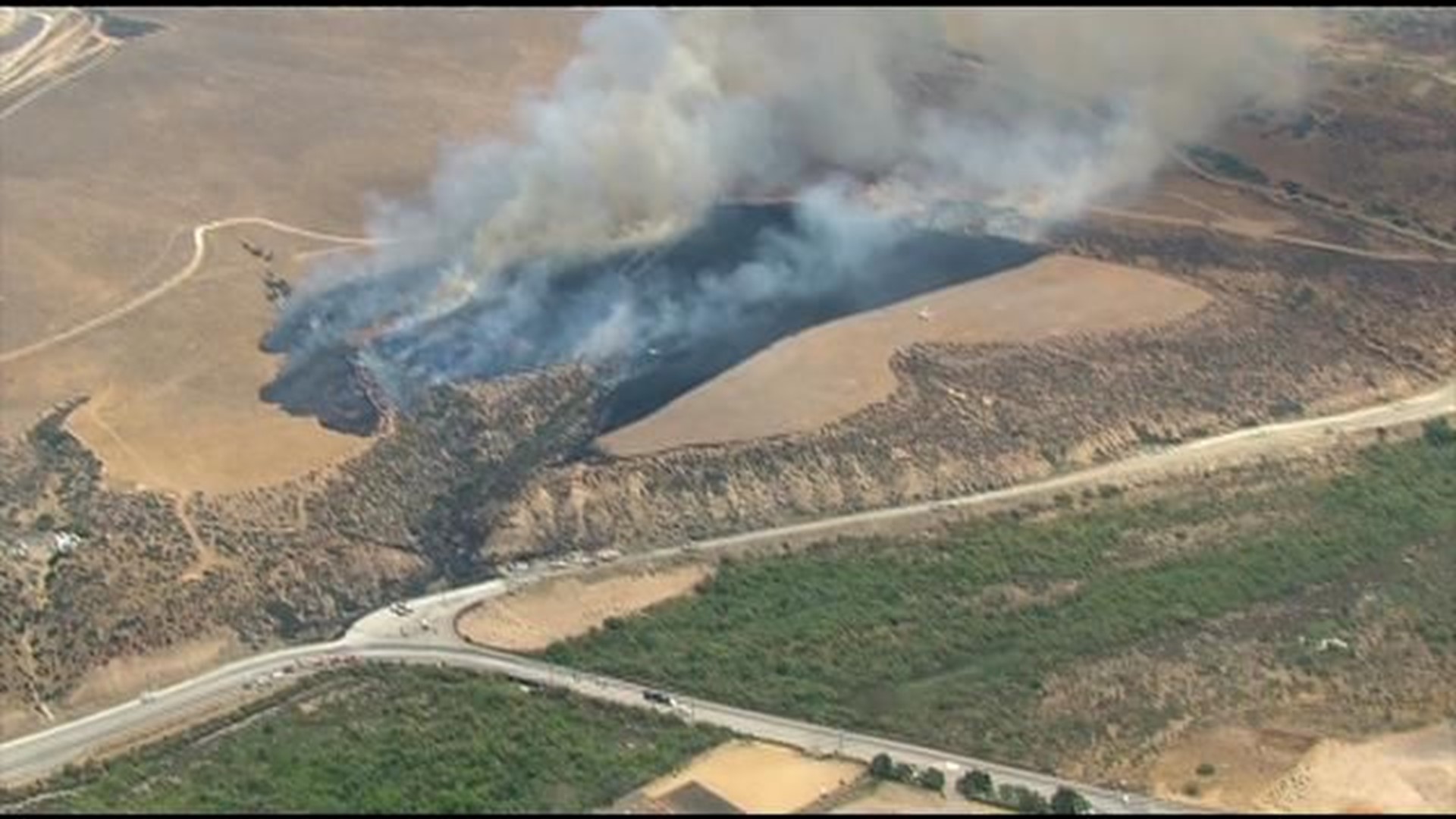 Otay Mesa brush fire causes outage, closes SeaWorld's Aquatica ...