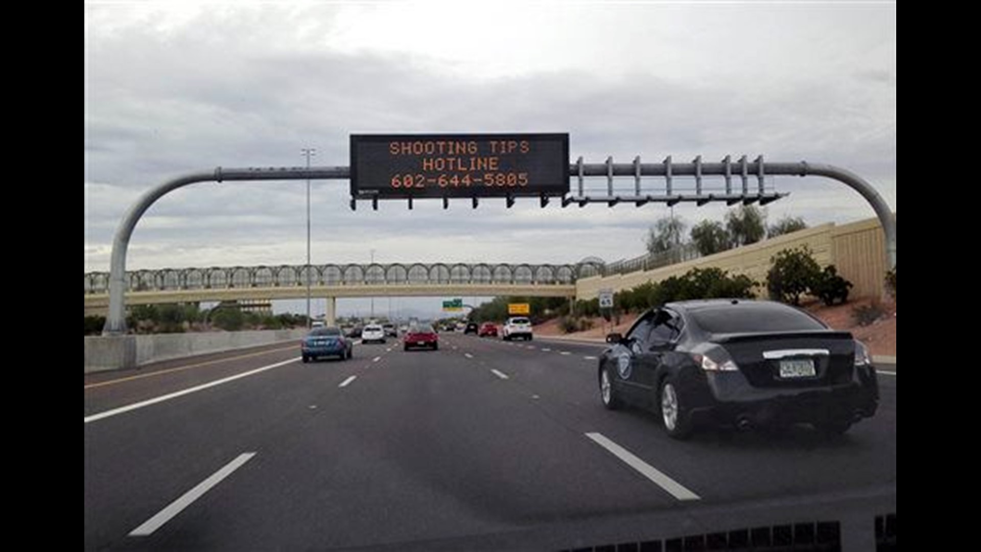 Projectile hits car in Phoenix amid spate of shootings | cbs8.com