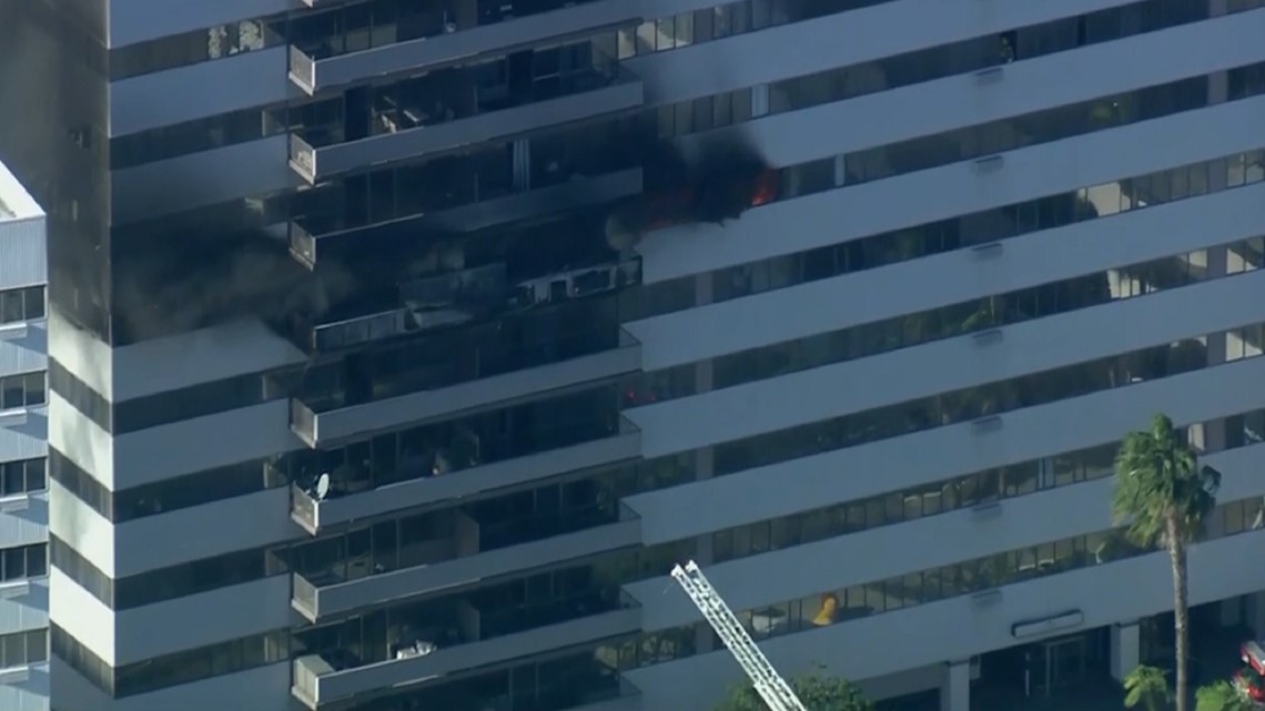 Watch live: High-rise fire erupts at residential building in Los ...
