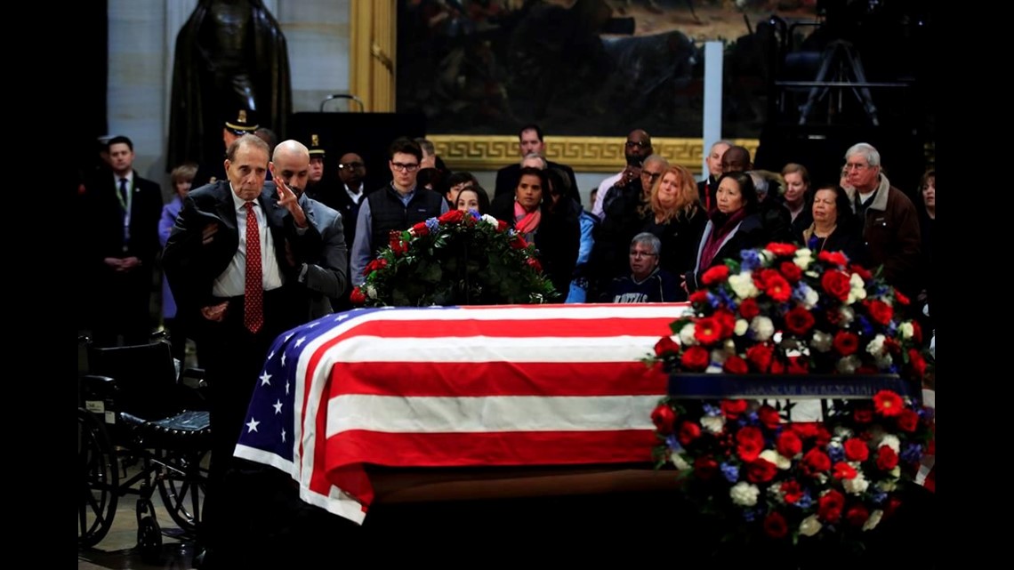 Greatest Generation: Frail Bob Dole salutes fellow hero Bush 41 | cbs8.com