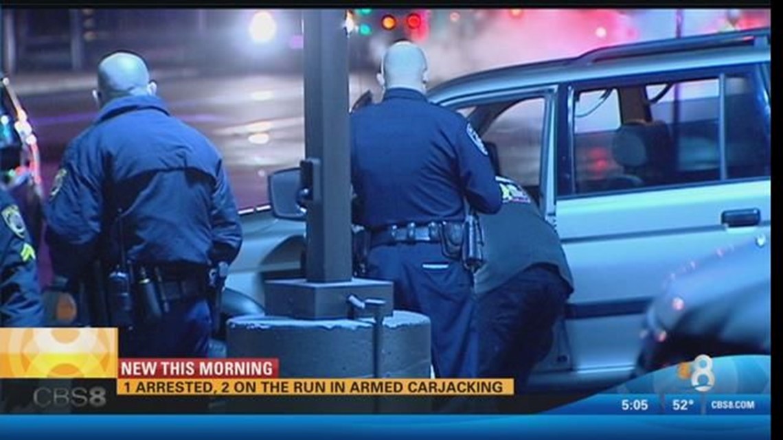 One arrested, two on the run in armed carjacking | cbs8.com