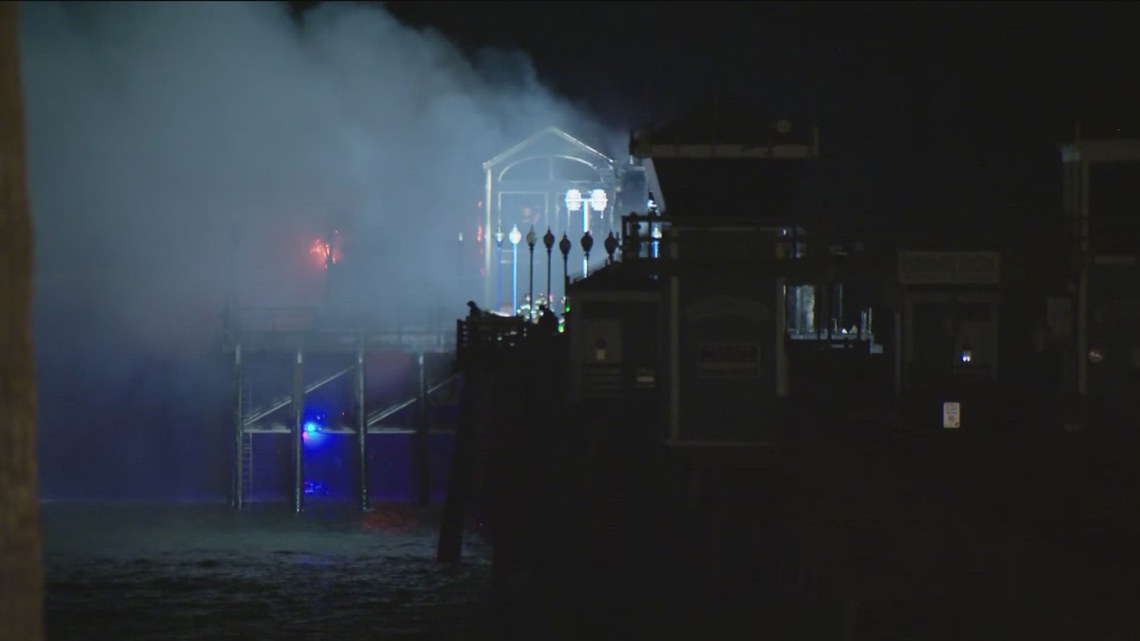 As many as 100 firefighters continue to extinguish flames on 'iconic' Oceanside Pier | 10 p.m ...