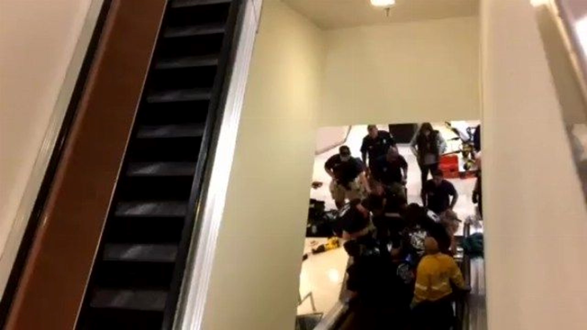 Boy rescued after getting foot trapped in escalator | cbs8.com