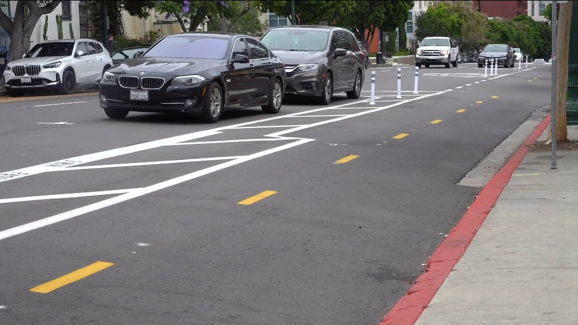 Little Italy church raises safety concerns over new protected bike lane ...
