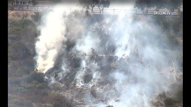 Firefighters knock out brush fire in Chula Vista canyon | cbs8.com