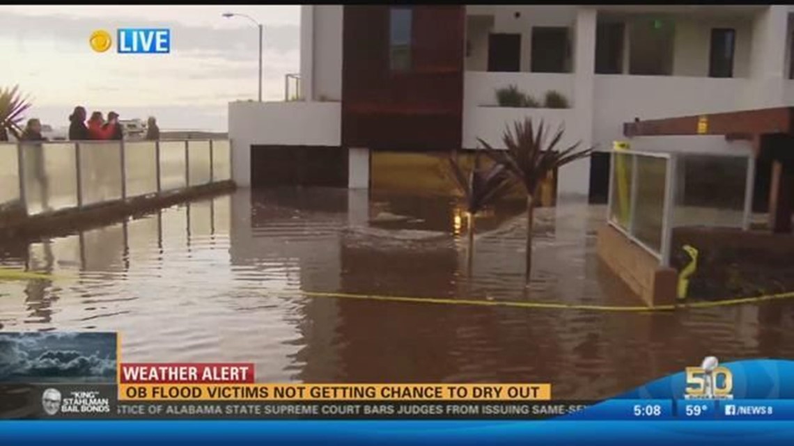 Ocean Beach flood victims not getting chance to dry out | cbs8.com