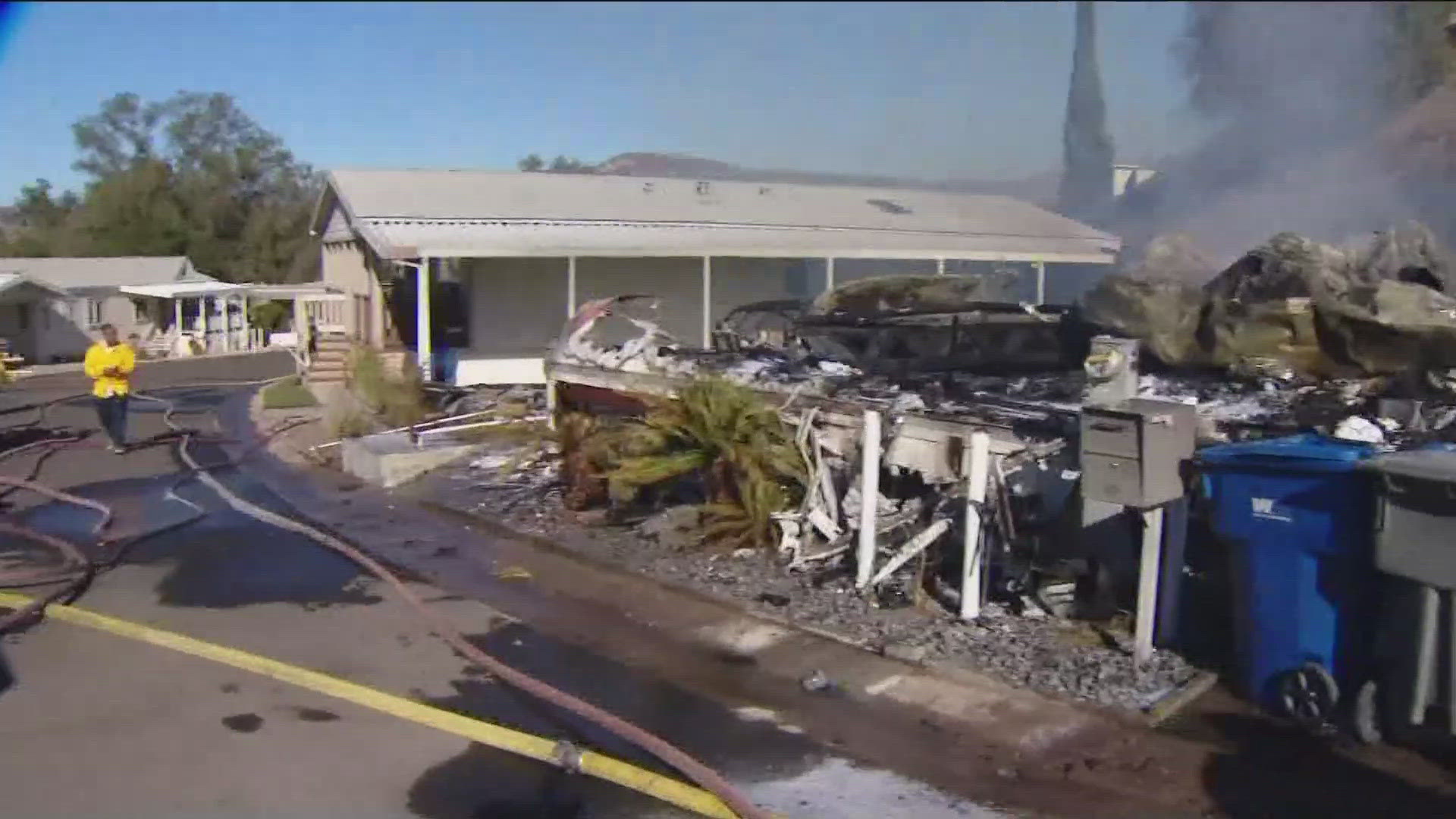 Neighbors react to brush fire that destroyed multiple homes in Lakeside ...