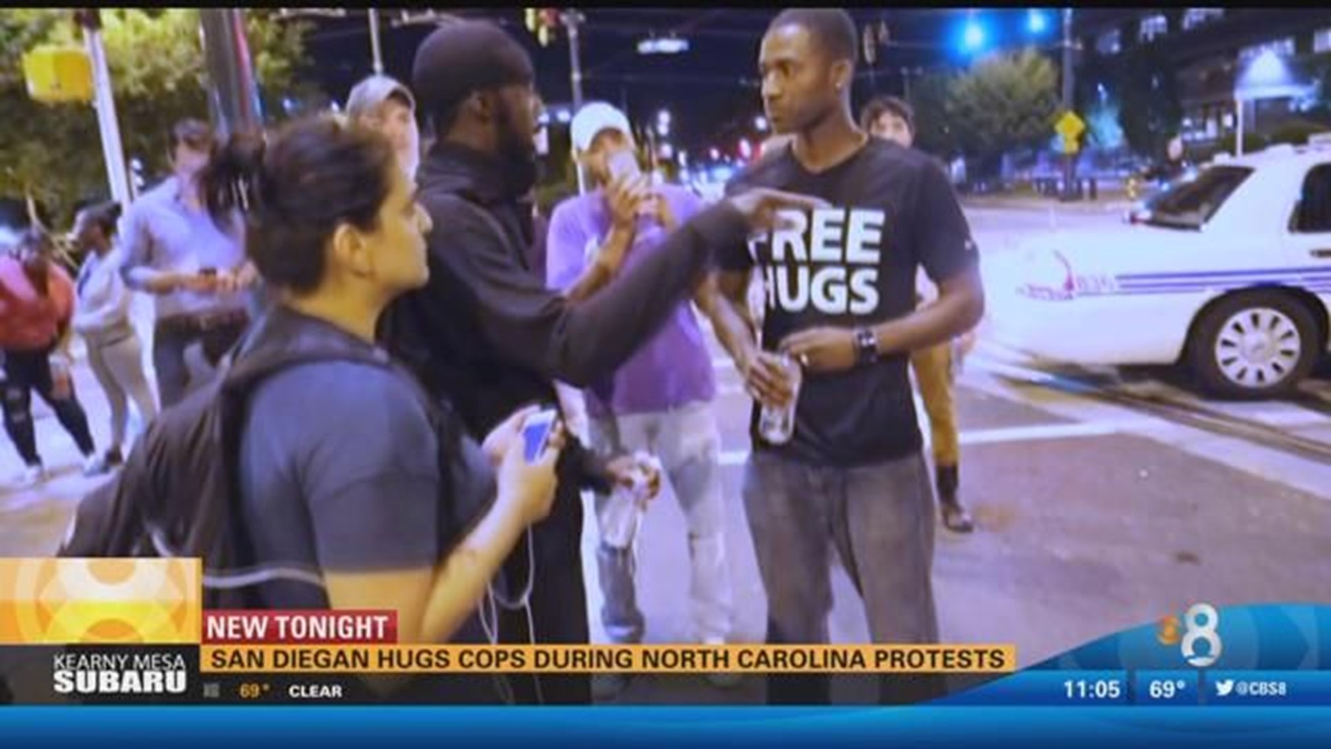 Chula Vista man hugs police during North Carolina protests | cbs8.com