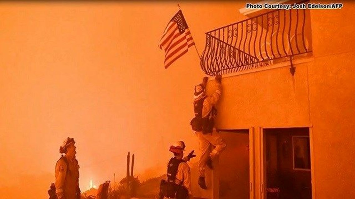 Firefighters save flag amid California wildfires | cbs8.com