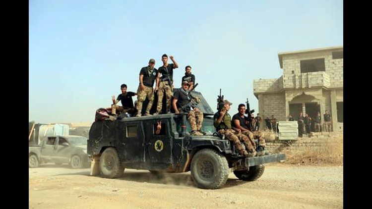 Iraqi PM signals start of operations to drive IS from Mosul | cbs8.com