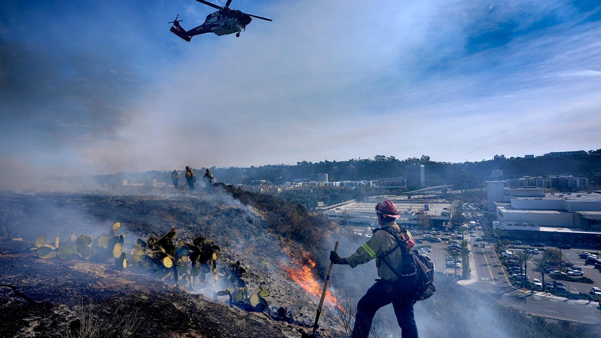 Brush fire, smoke, flames in San Diego near Fashion Valley Friars Rd ...