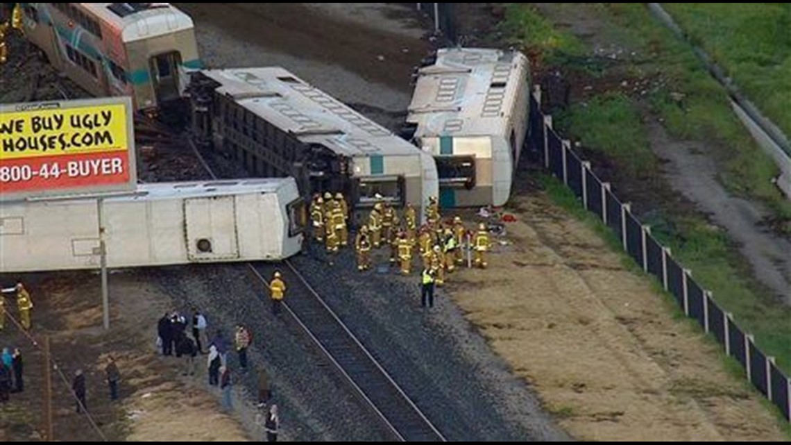 Truck stalls on track before fiery train crash, 28 injured | cbs8.com