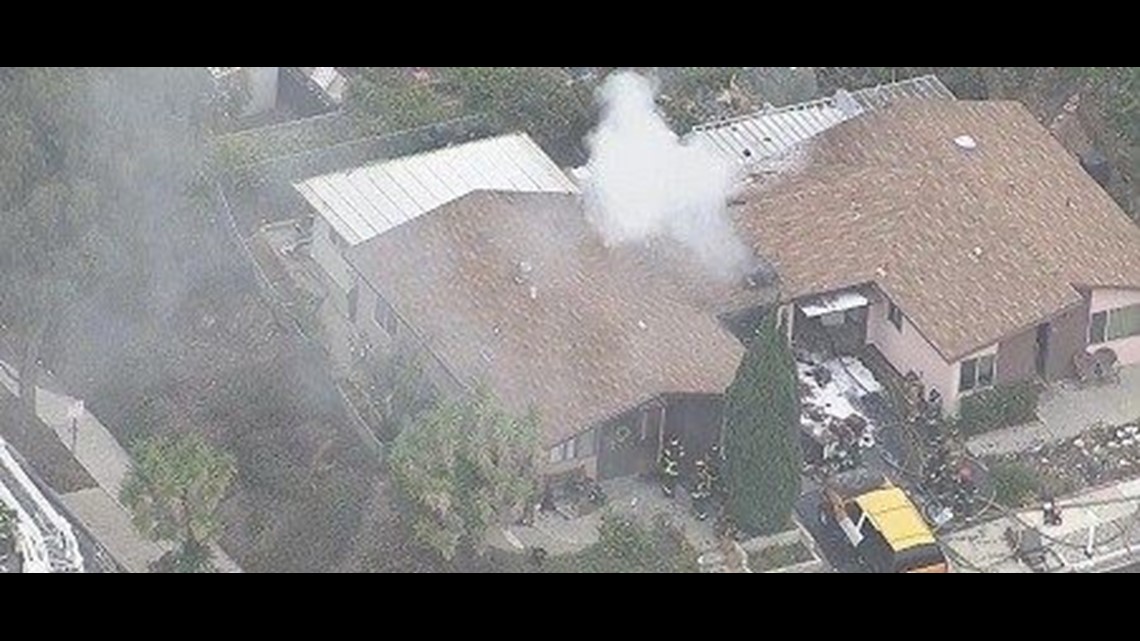 Firefighters battle house fire in Oceanside | cbs8.com