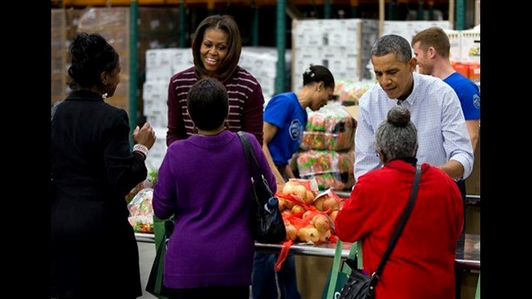 Obama helps hand out Thanksgiving fixings to needy | cbs8.com