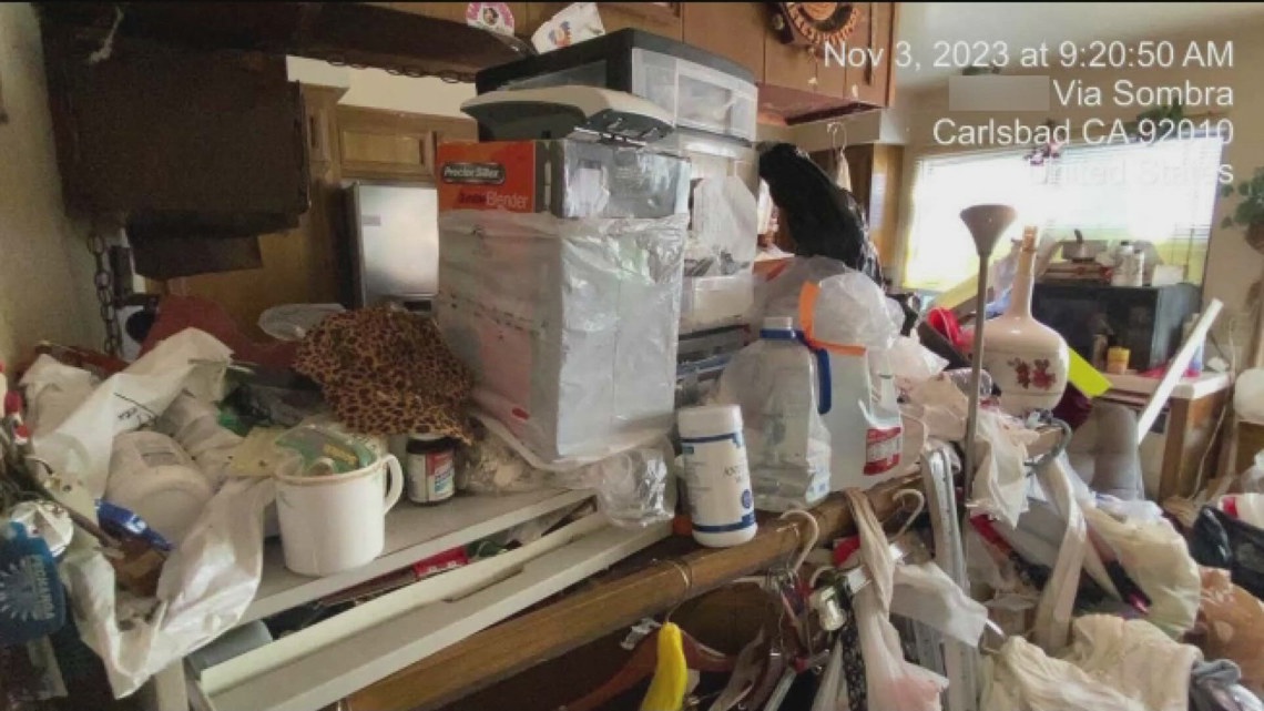Carlsbad neighbors try to help woman inside hoarder home | cbs8.com