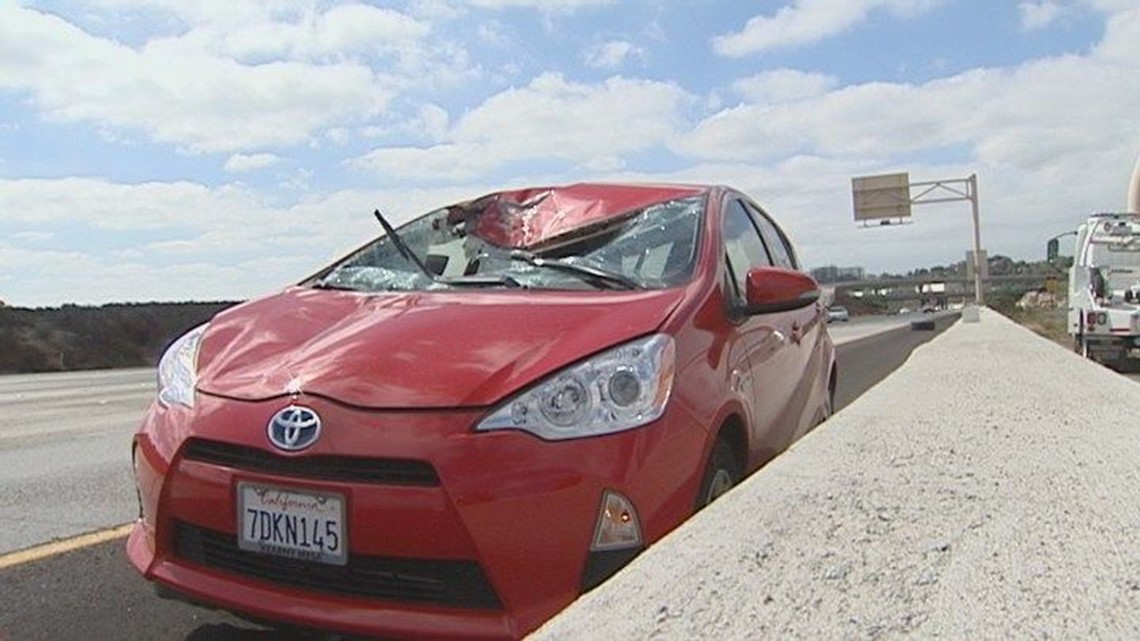 Tire flies off one vehicle and crashes into another | cbs8.com