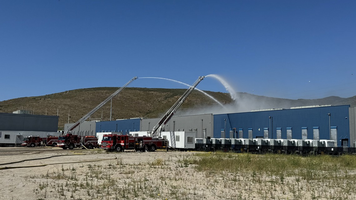 Battery storage facility fire under control, still burning | cbs8.com