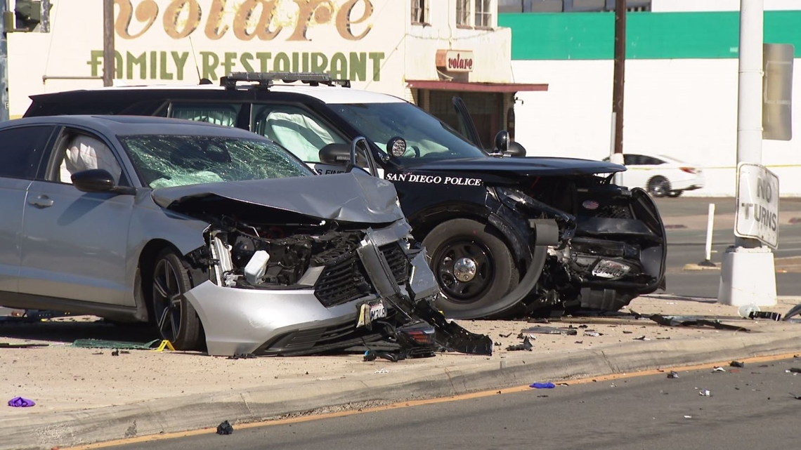 4 people, including 2 SDPD officers, hospitalized after crash | cbs8.com