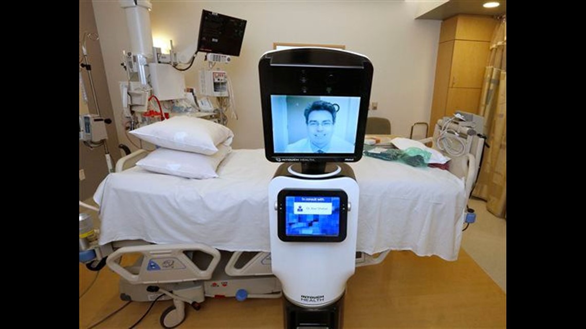 Robots let doctors 'beam' into remote hospitals | cbs8.com
