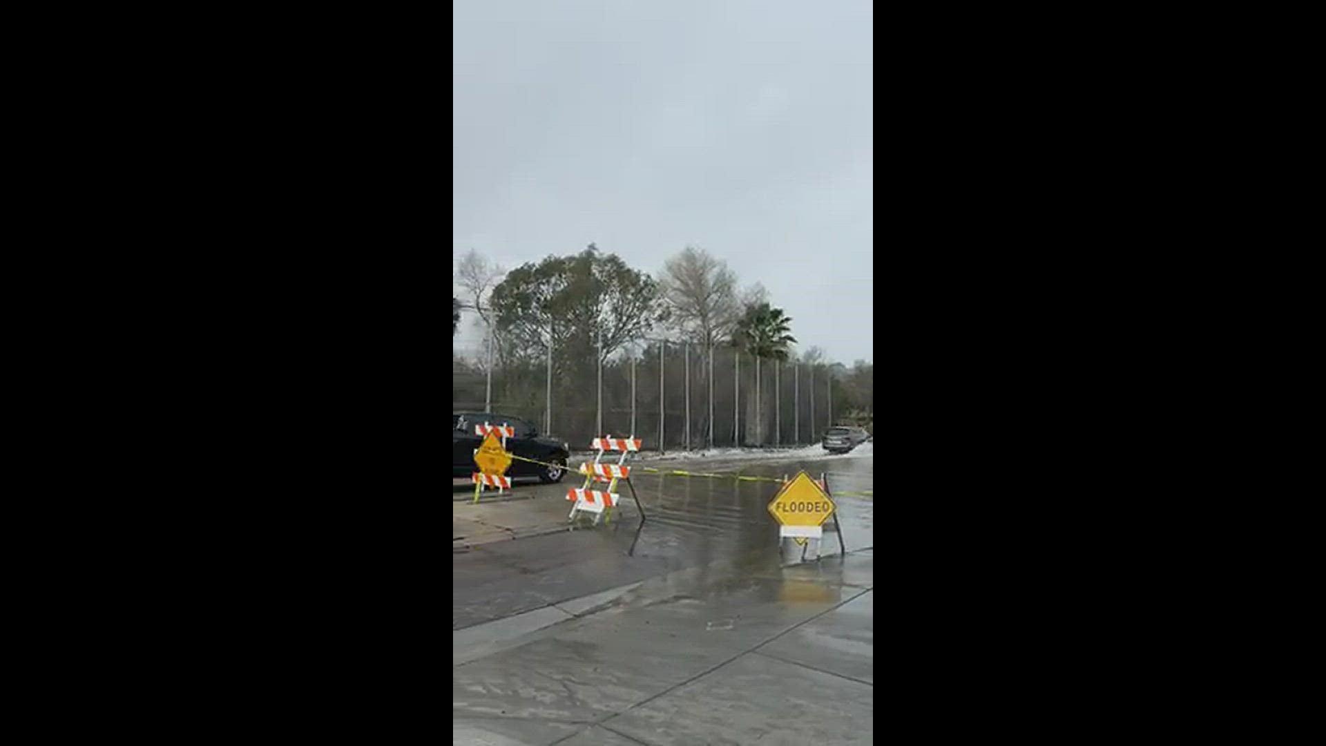 Cars driving through flooding in Mission Valley | cbs8.com