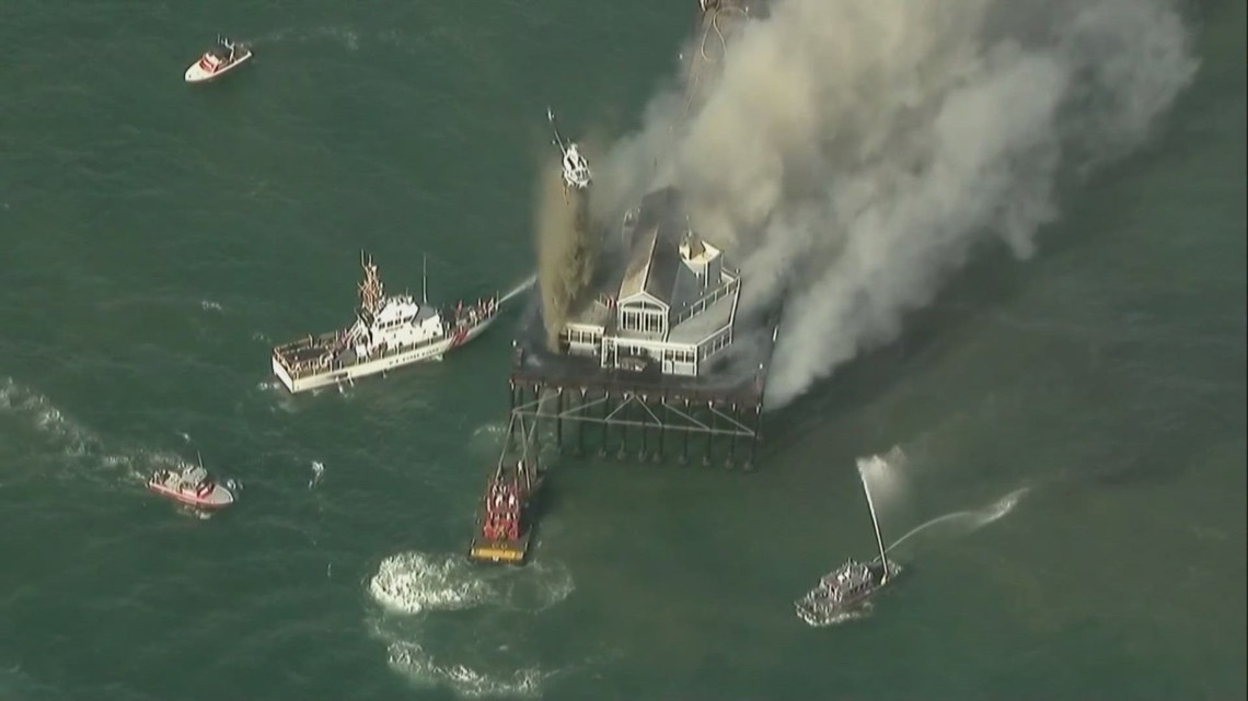 Oceanside Pier Fire | Water drop in action | cbs8.com
